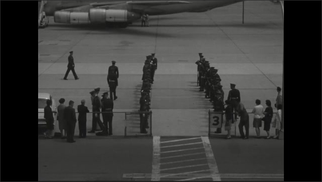1960s: Soldiers line up in two lines on either side of entrance to ...