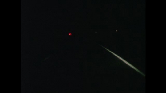 United States: 1950s: flashing red light on ambulance roof at night ...