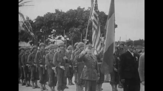 UNITED STATES: 1940s: Soldiers salute. Victory over Rommel. Military ...