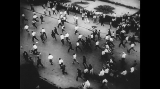UNITED STATES 1950s: High angle views of rioting in Iran / Leaders at ...
