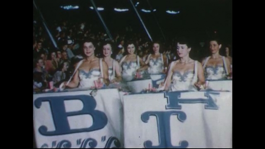 UNITED STATES 1950s: Women dance in costume at circus / Swirling liquid ...
