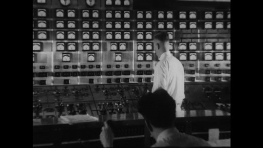 UNITED STATES 1930s-1940s : A switchboard operator checks the display ...