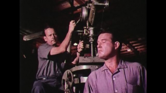 UNITED STATES: 1950s: Two man control film camera equipment and sound ...