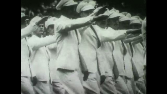 BERLIN 1936: Athletes march while saluting Hitler at Olympic opening ...