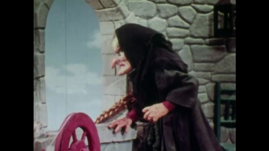 UNITED STATES: 1950s: Witch takes Rapunzel from her tower. Witch puts ...