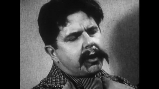 UNITED STATES: 1950s: face of man speaking. Side profile of face ...