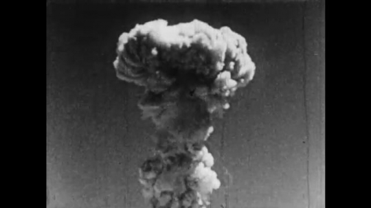 1950s: UNITED STATES: white cloud expands in sky after nuclear ...