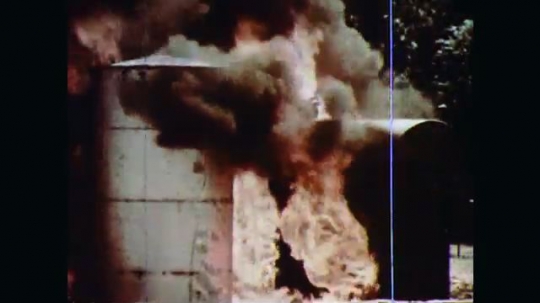 1970s: A vertical tank and a horizontal tank adjacent to each other ...