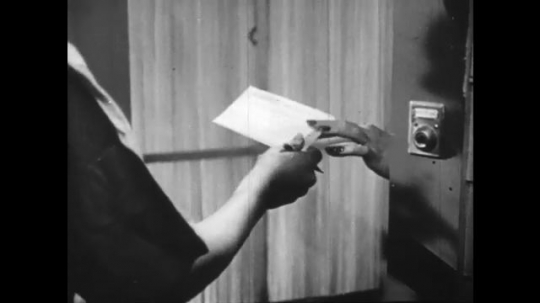 Europe 1940s: hand delivers telegram. Stars on sign. Photos of man in ...