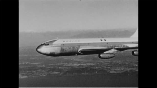 1940s: Commercial airplane in flight. – Archival Footage