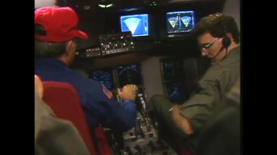 UNITED STATES: 1990s: pilot and co pilot in cabin of plane. View from ...