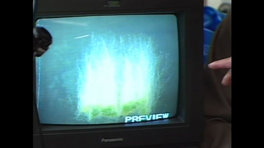 UNITED STATES: 1980s: scientists look at cells on computer screen ...
