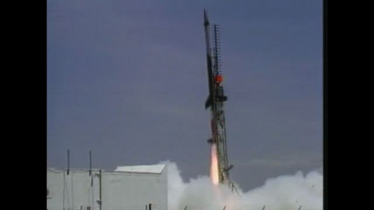 UNITED STATES: 1990s: Sub orbital rocket takes off. View of Earth from ...