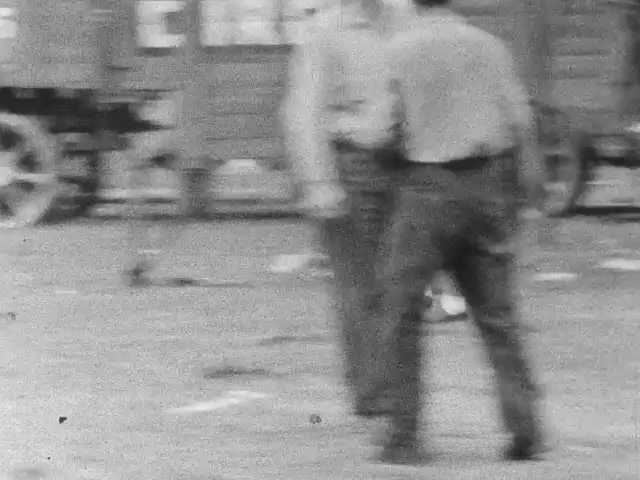 1940s: Female circus acrobat and costumed gypsies warm up with flips ...