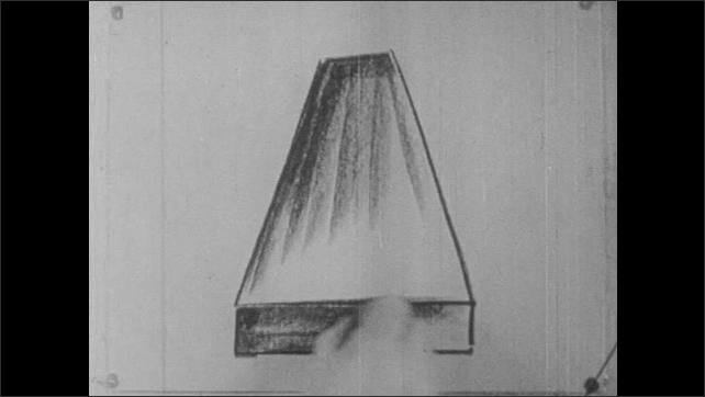 1960s: Person shades in drawing on paper, adds additional lines as ...