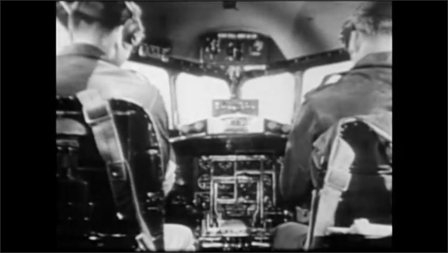 1960s: Men point guns from plane. Hatch closes over bomb. Plane takes ...