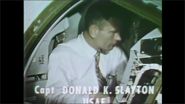 1960s: Captain Donald K. Slayton, wearing dress shirt and tie, sits in ...