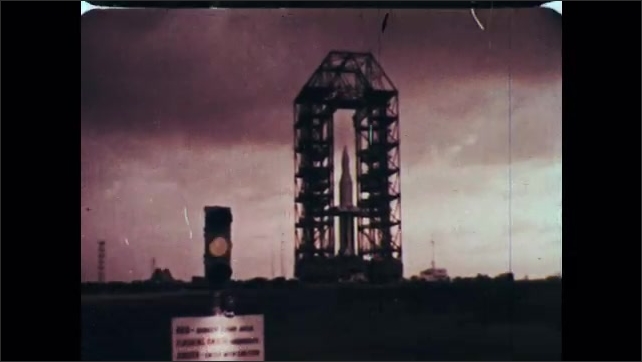 1960s: Spherical structure . Rocket held within tall structure ...