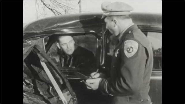 1950s: Police man talks to man sitting in car at scene of accident ...