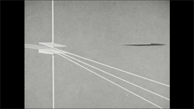 1940s: Animated radiation particles pass through field on mass ...