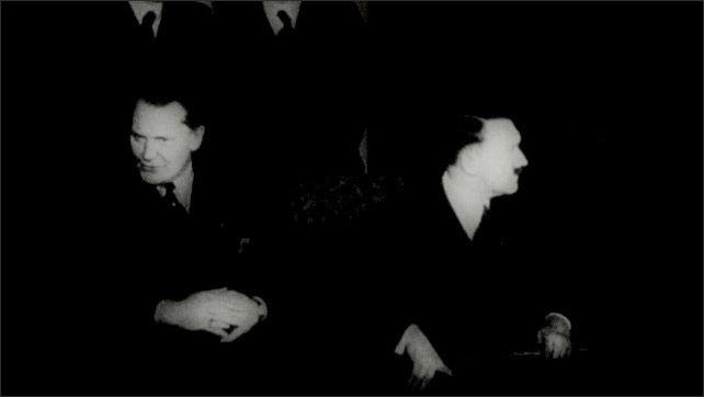 1930s: Men sitting in room, talking. Adolf Hitler sitting with Hermann ...