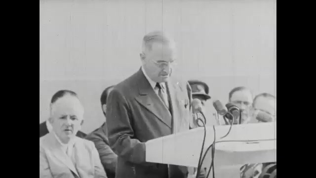 1950s: Harry S Truman gives a speech, with people sitting behind him ...