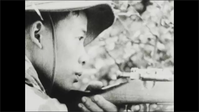 1960s: VIETNAM: soldiers with guns walk through jungle. Soldiers on ...