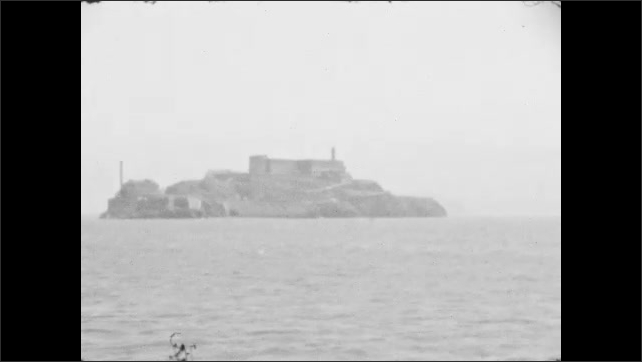 1920s: Plane flies in sky. Alcatraz island and prison. – Archival Footage