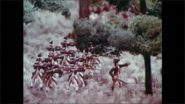 1970s: Military figurines on a landscape. Wargaming figures in fighting ...