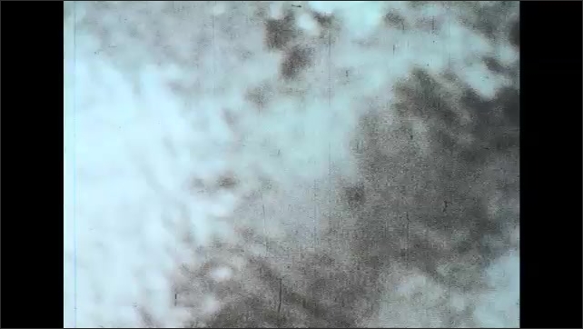 1950s: Man in nuclear power plant / View of reactor in water ...