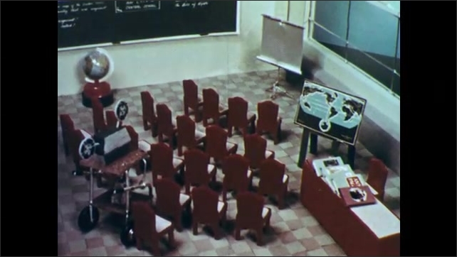 1950s: UNITED STATES: model of a room. Hand places screen in corner of ...