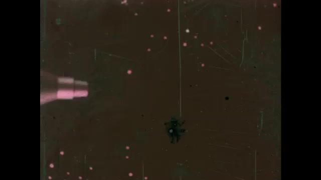 1960s: Rocket in space rotates. View of Earth from space. Satellite ...