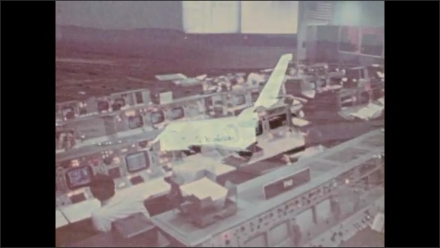 1970s: Image of space shuttle overlayed over image of NASA control room ...