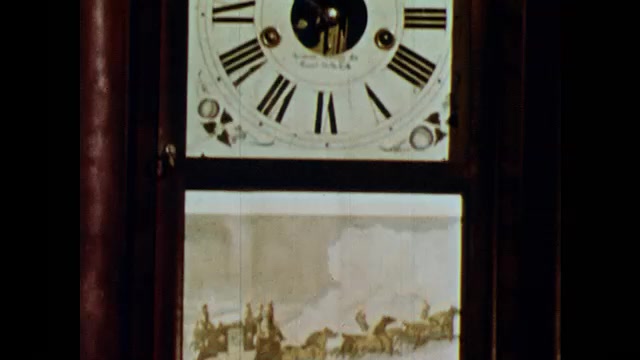 1960s: Grandfather clock. Pendulum on clock swings. Pendulum on ...