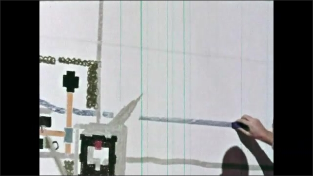 1960s: Men push man on ladder by large map. Men by map with ladders ...