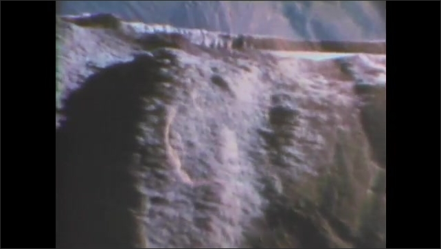 1970s: Model of volcano Olympus Mons on Mars, caption with text “Nix ...