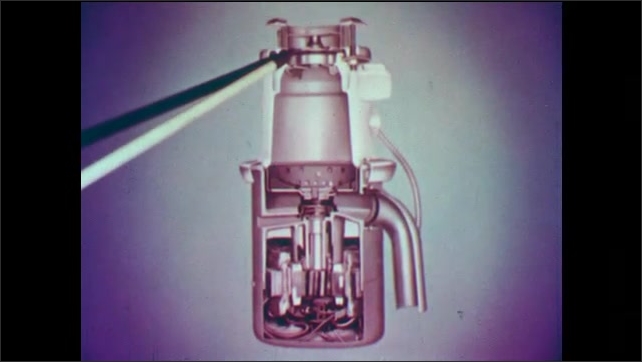 1950s: Illustrated cross section of garbage disposal. Wooden pointer ...