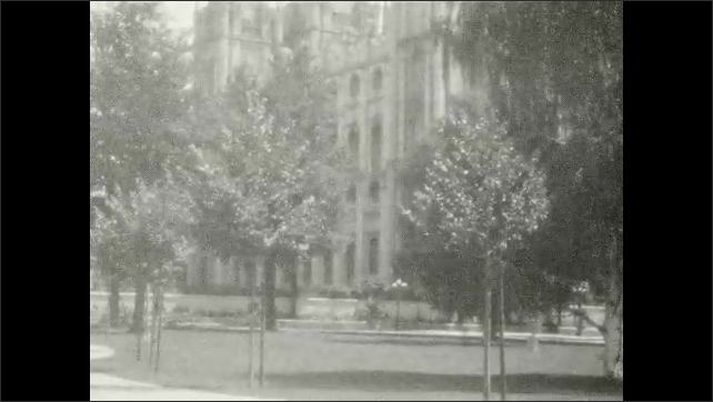 1920s: Grounds of Mormon temple in Salt Lake City. Log cabin and sign ...