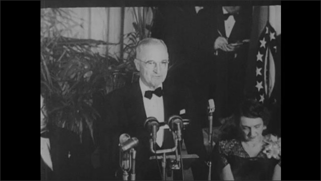 1940s: People sit at tables, clap. Truman makes a speech, people clap ...