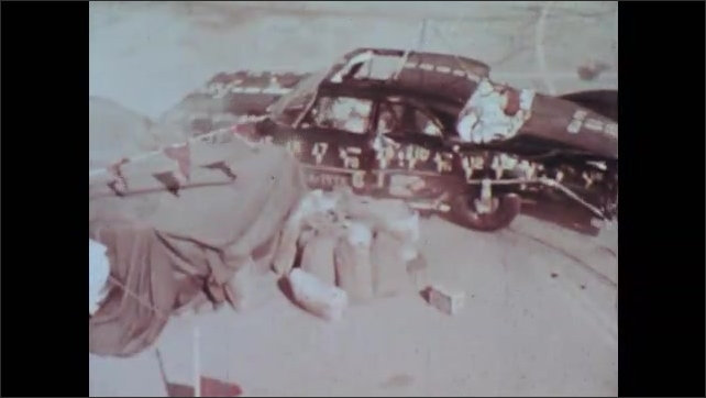 1960s: Test drive scenario where a car drives parallel with another car ...