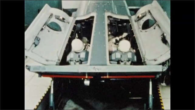 1960s: Rocket capsule simulator is piloted into docking position ...