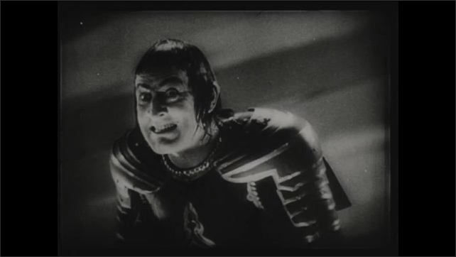 1940s: Man in armor speaking, gesturing expressively. Philharmonic ...