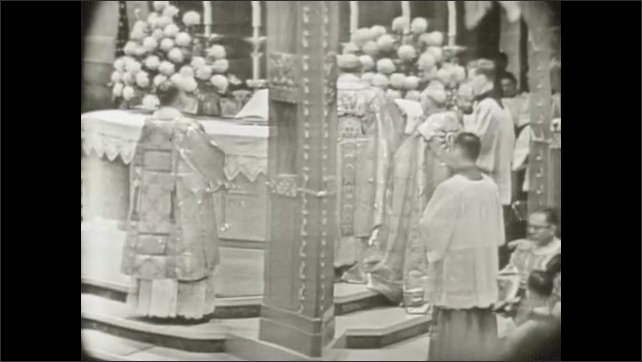 1950s: UNITED STATES: final prayer of mass. Lord be with you. Let us ...