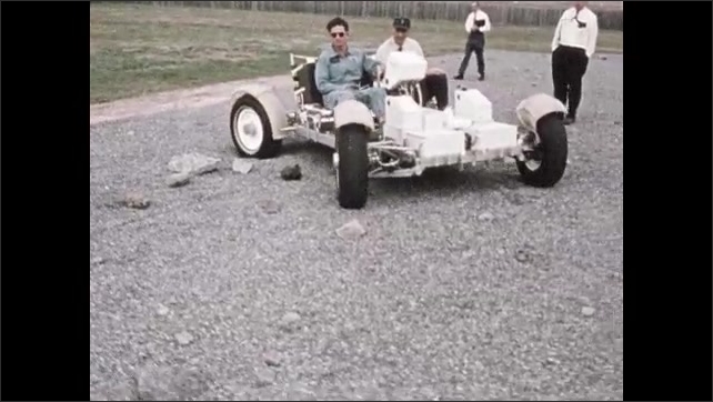 1960s: Men inside rocket prototype. Men test driving lunar rover on ...