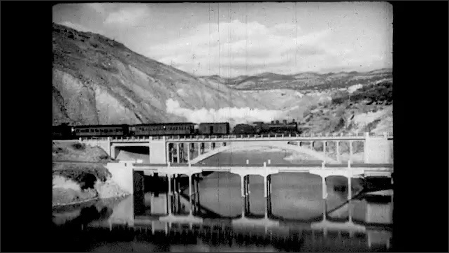 1960s: construction site, dam, factory, power plant, train driving over ...