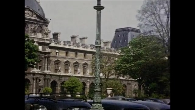1940s: Woman poses outside of Louvre Museum in Paris, France ...