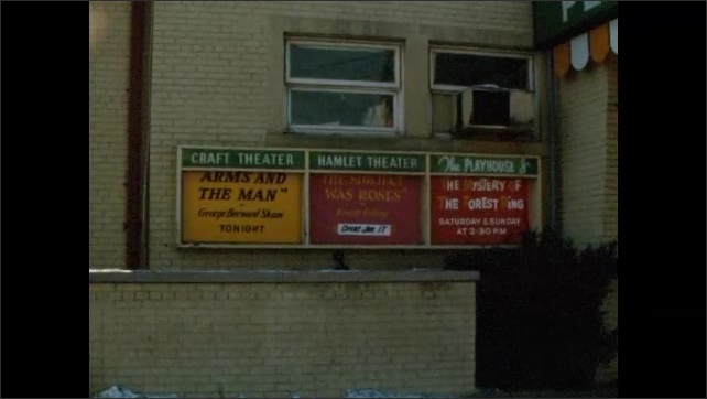 1970s: UNITED STATES: Theatre billboards and posters by the Playhouse ...