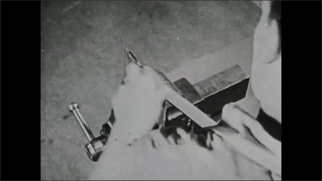 1950s: UNITED STATES: lung moves inside chest cavity. Surgeon closes up ...
