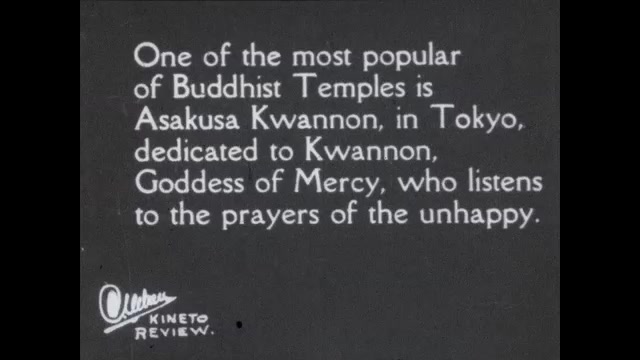 1920s: Intertitle. People walking up and down steps of temple ...