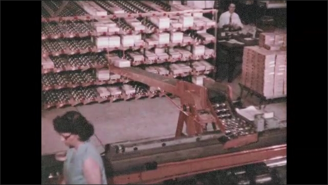 1950s: UNITED STATES: cartons of records on conveyor box. Cartons in ...